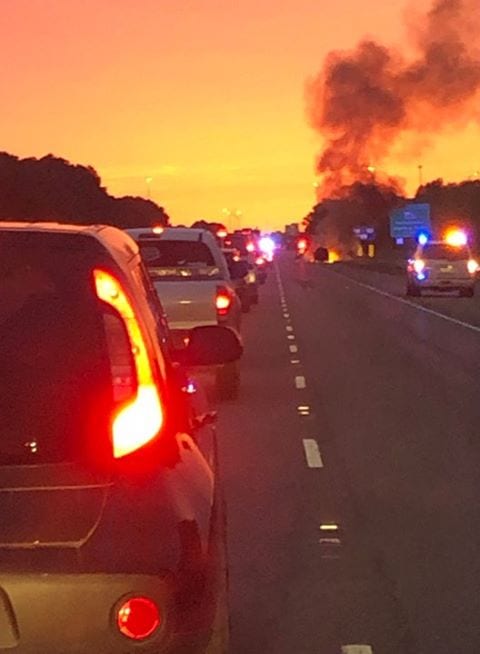 Vehicle fire causes delays on I-10 East near Ambassador