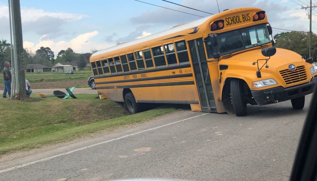 Bus drives into ditch; no students injured